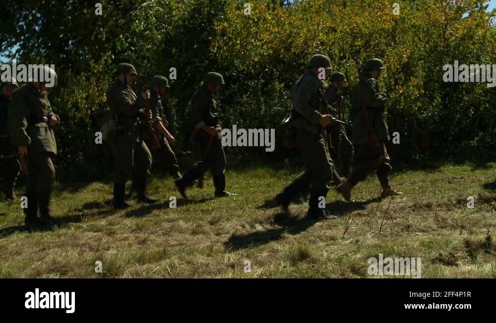 WWII German soldiers march from shade Stock Video Footage - Alamy