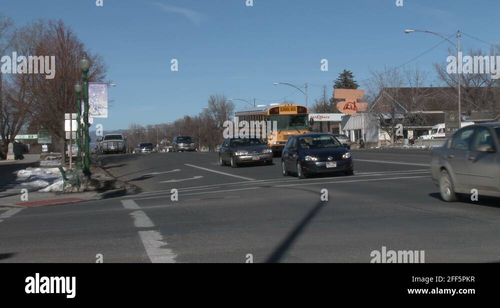 Rural town Main Street School bus traffic 4K 0026 Stock Video Footage ...
