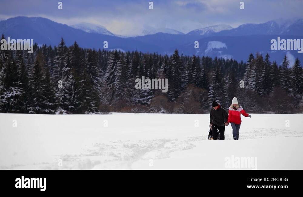 Mother father walk through snow Stock Videos & Footage - HD and 4K ...