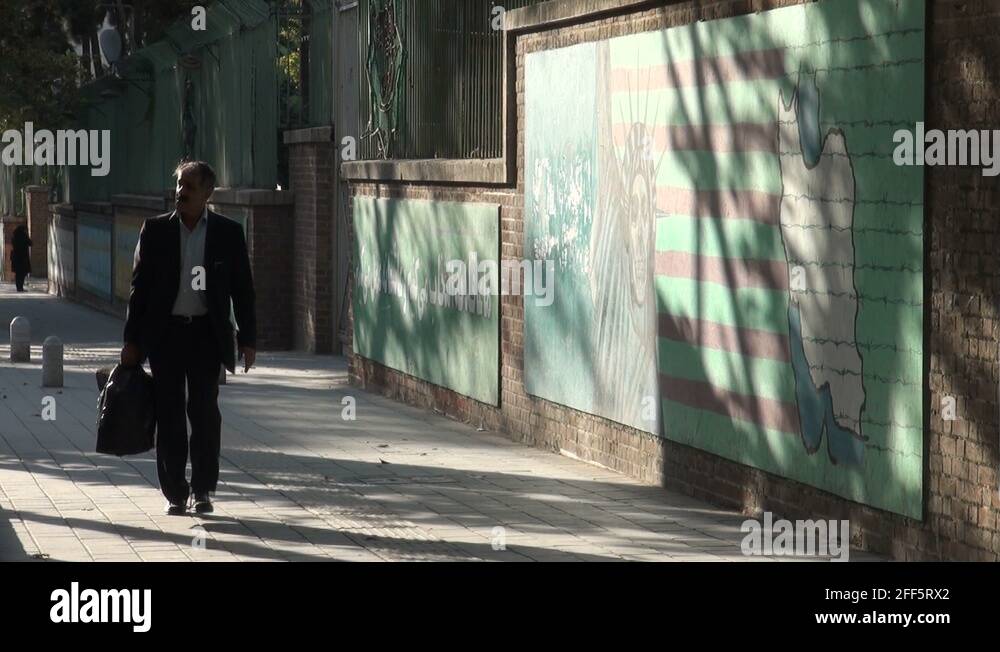 Tehran, former US Embassy, hostage crisis scene 1979, Iran, man walking ...