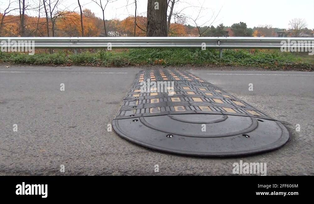 Speed bump on road Stock Videos & Footage - HD and 4K Video Clips - Alamy