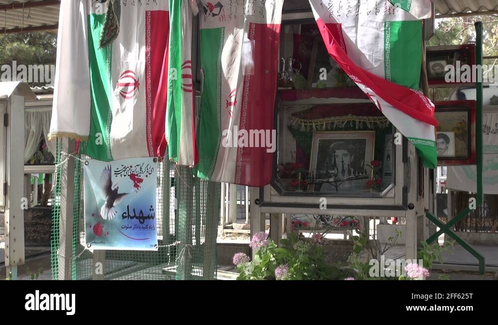 Iran - Iraq war cemetery in Tehran, flags and portraits of victims ...