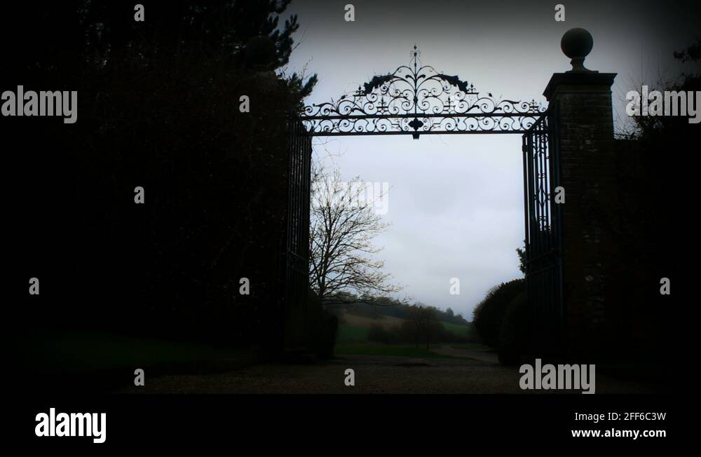 Horror, gates to creepy mansion (slow motion dolly Stock Video Footage ...
