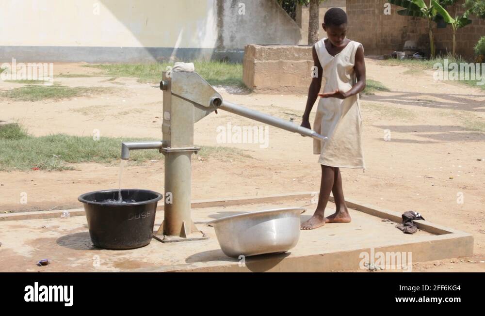 Girl fetching water Stock Videos & Footage - HD and 4K Video Clips - Alamy