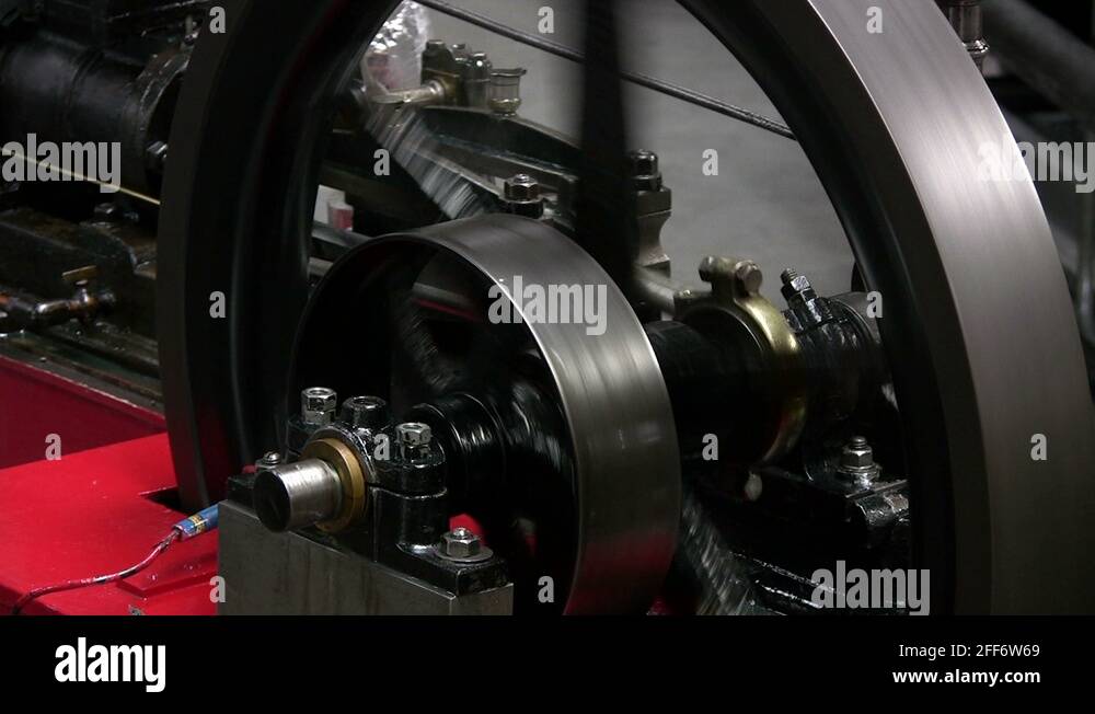 Stationary steam engine flywheel and valve gear eccentric Stock Video ...