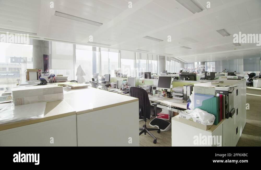 Interior view of office work stations in large contemporary city office ...