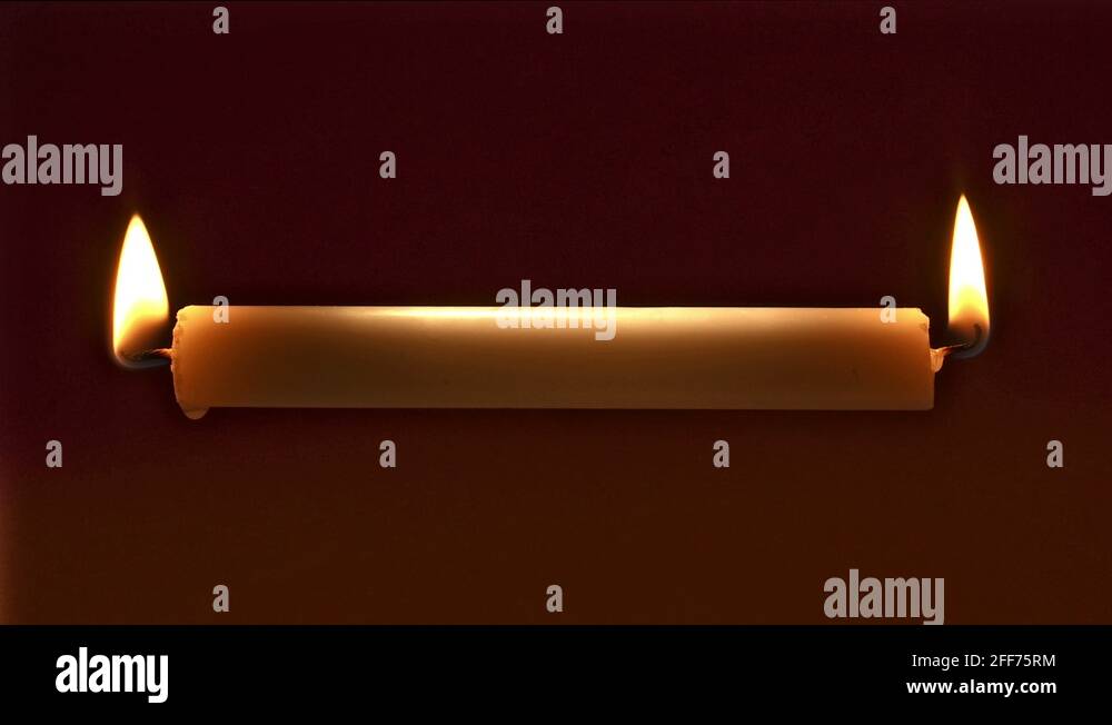 Candle both ends Stock Videos & Footage - HD and 4K Video Clips - Alamy