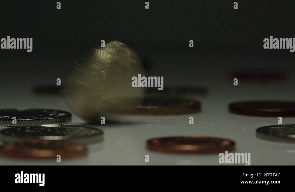 Uk one pound coins Stock Videos & Footage - HD and 4K Video Clips - Alamy
