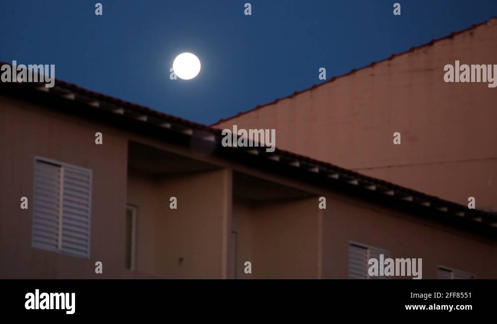 Moon behind the building Stock Videos & Footage - HD and 4K Video Clips ...