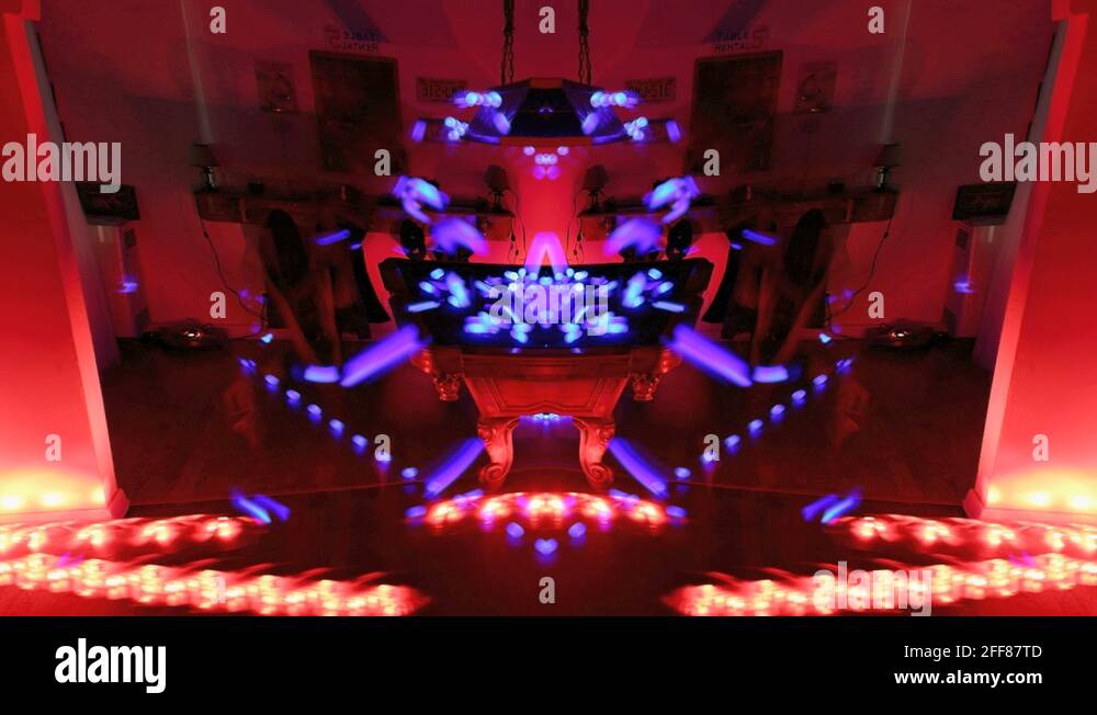 Trippy light show around psychedelic billiards table arcade room Stock ...