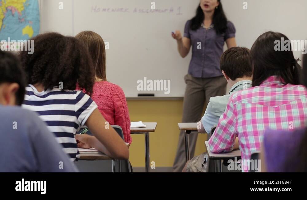 Junior high school teacher classroom Stock Videos & Footage - HD and 4K ...