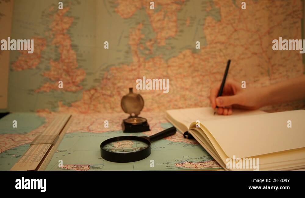 Writing in a notebook, ship's register, measurements,geography, map ...