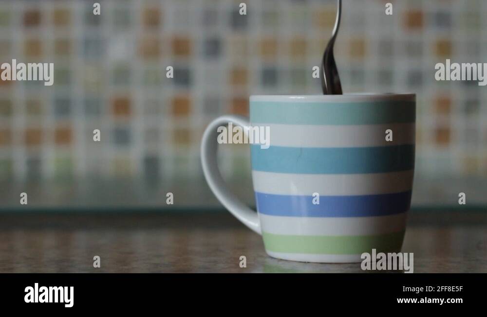 Stirring tea cup Stock Videos & Footage - HD and 4K Video Clips - Alamy