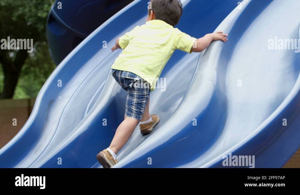 Boy on a slide Stock Videos & Footage - HD and 4K Video Clips - Alamy