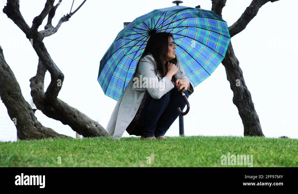 Woman in storm Stock Videos & Footage - HD and 4K Video Clips - Alamy