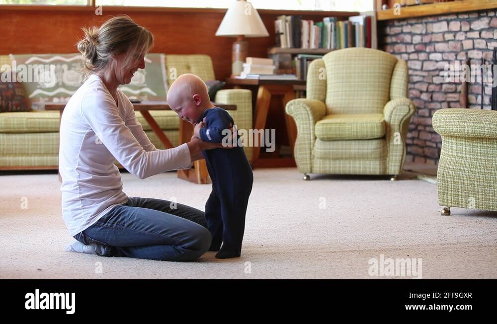 Crouching mother hugging her child Stock Videos & Footage - HD and 4K ...