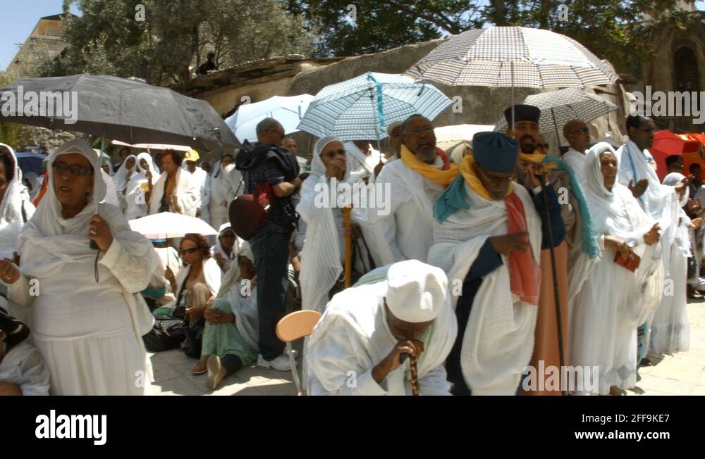 4K UHD Ethiopian Orthodox pilgrims at Deir es Sultan by the dome of St ...