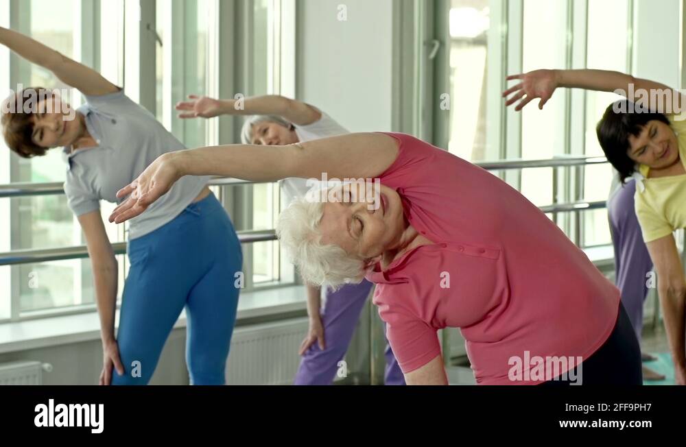 Bend over stretching Stock Videos & Footage - HD and 4K Video Clips - Alamy