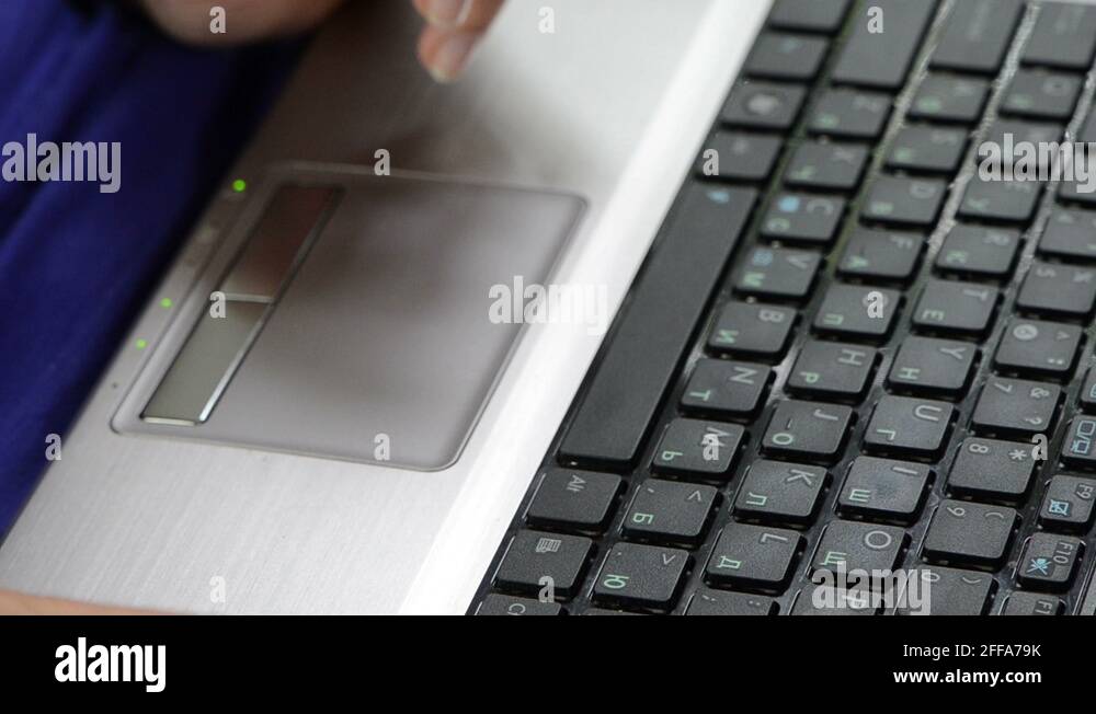 programmer hands touching touchpad and pushing keys of laptop Stock ...