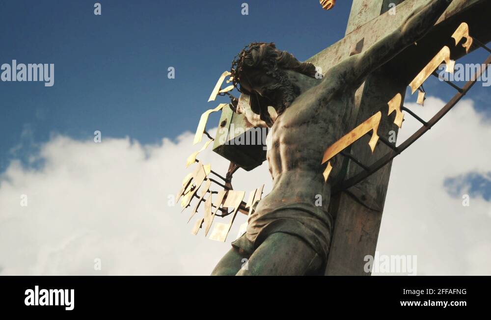 Crucifixion. Christian cross with Jesus Christ statue Stock Video Footage - Alamy