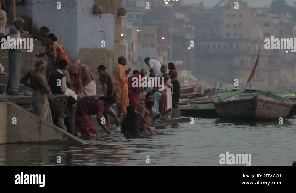Varanasi-bathing in river ganges Stock Video Footage - Alamy