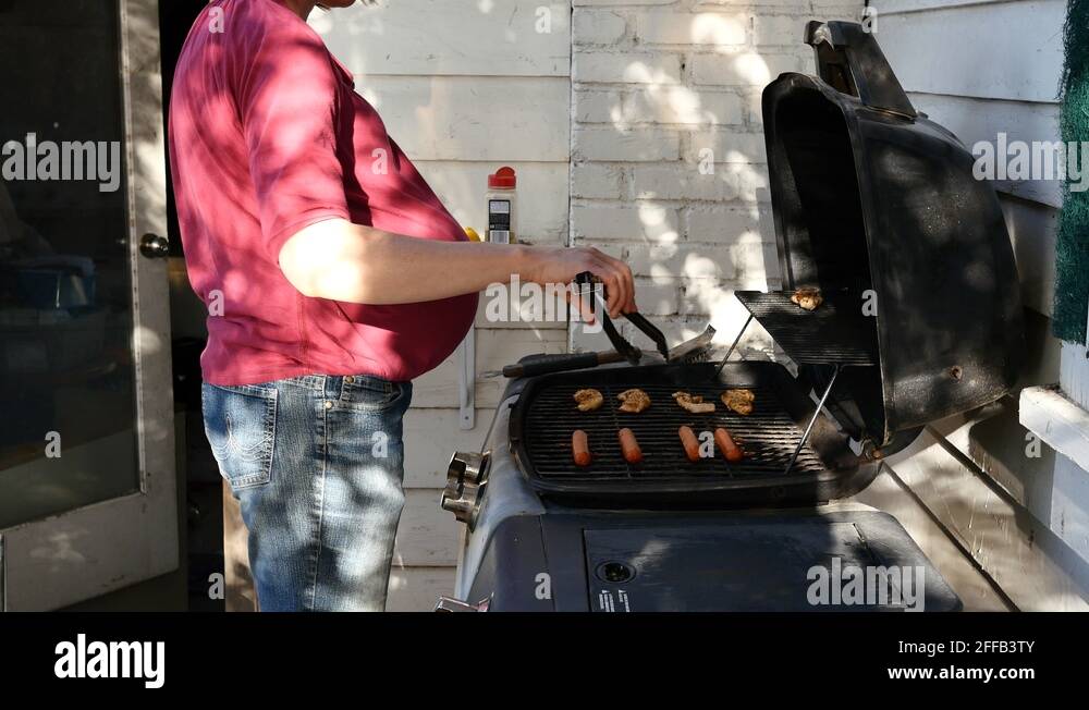 Woman cooking outside Stock Videos & Footage - HD and 4K Video Clips ...