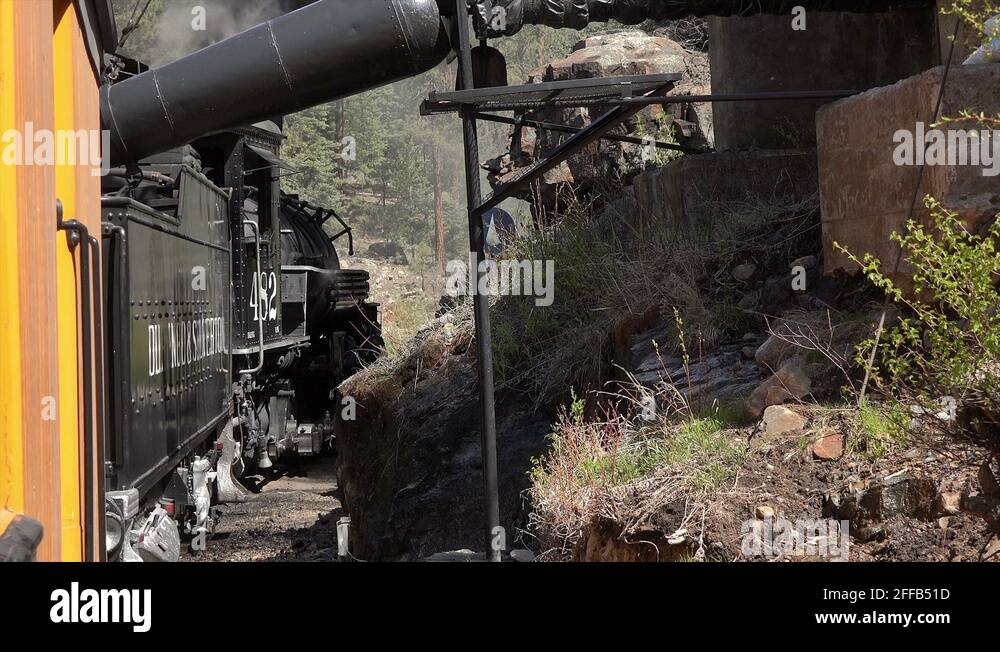 Historic steam engine loading water for steam HD Stock Video Footage ...
