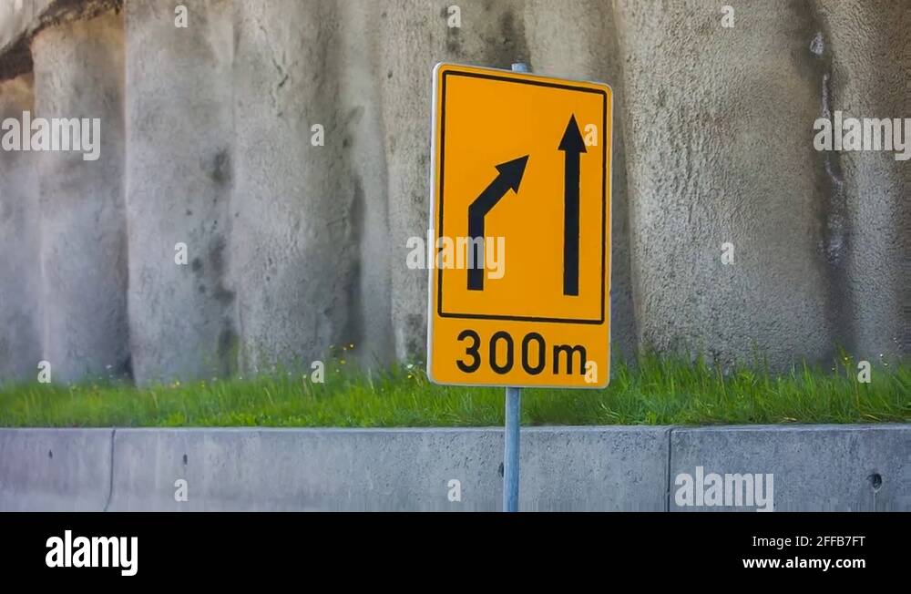 Narrow road ahead road sign Stock Videos & Footage - HD and 4K Video ...