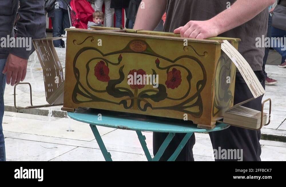 Barrel organ player Stock Videos & Footage - HD and 4K Video Clips - Alamy