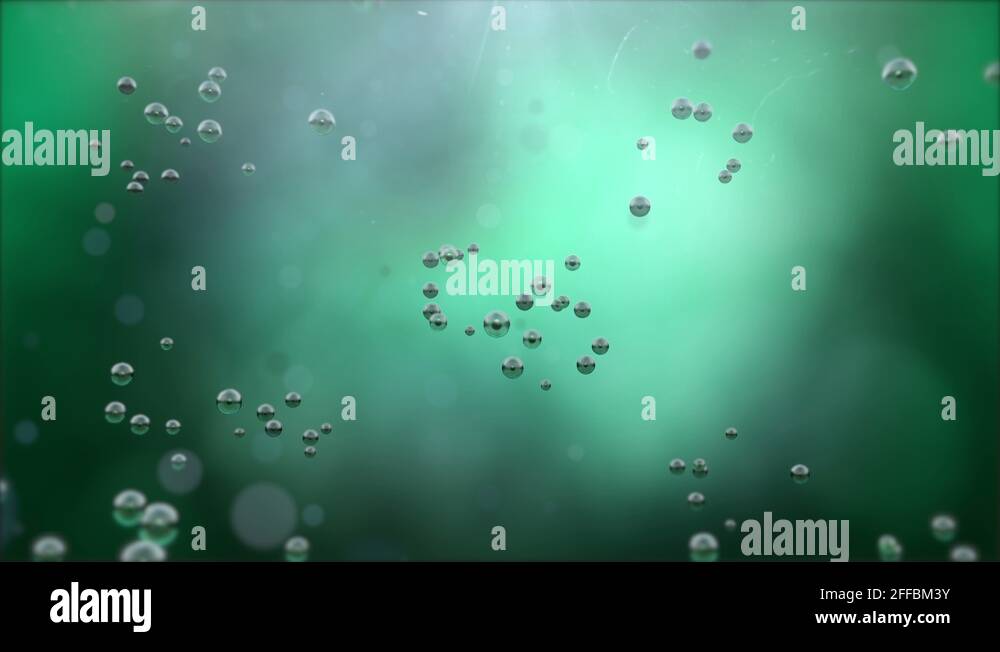 Floating cells on green background Stock Video Footage - Alamy