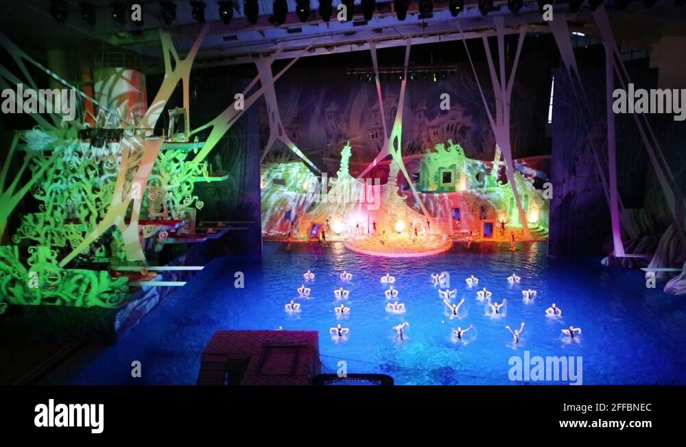 Actors on stage and synchronized swimmers at Swimming Pool Stock Video ...
