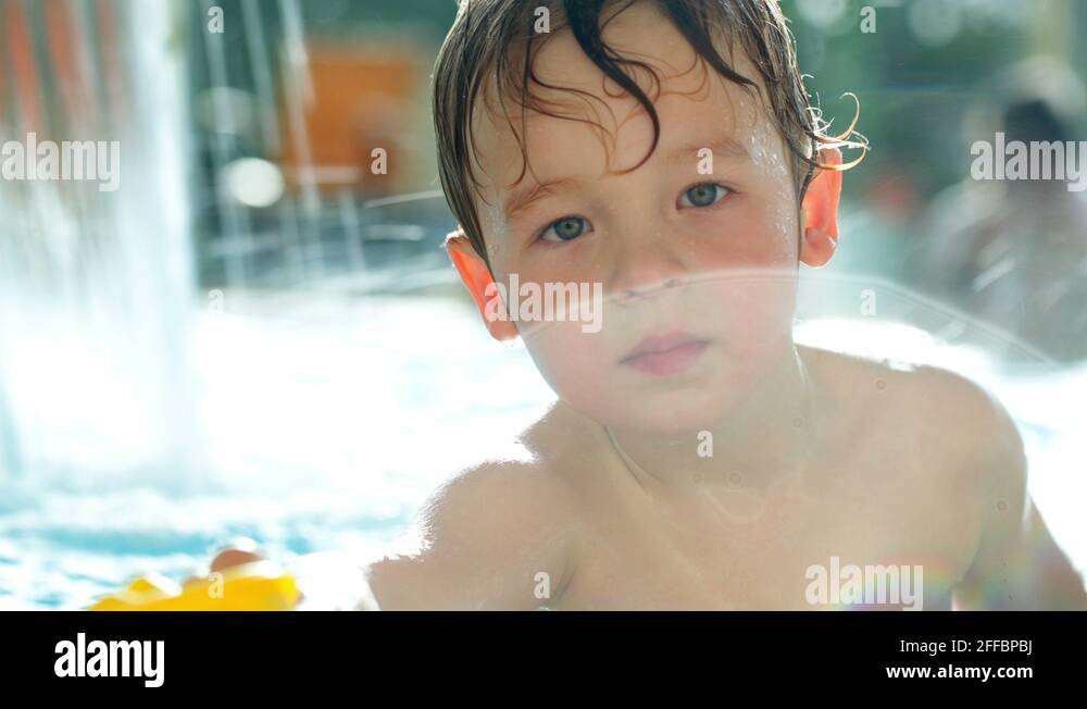Boy water splash Stock Videos & Footage - HD and 4K Video Clips - Alamy