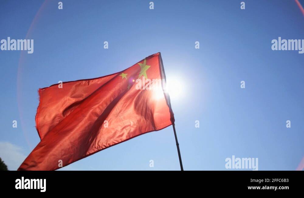 Chinese National Flag sun flare Great Wall of China red Beijing Stock ...