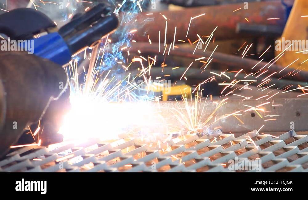 Welder Welding The New Grating in The Factory Stock Video Footage - Alamy