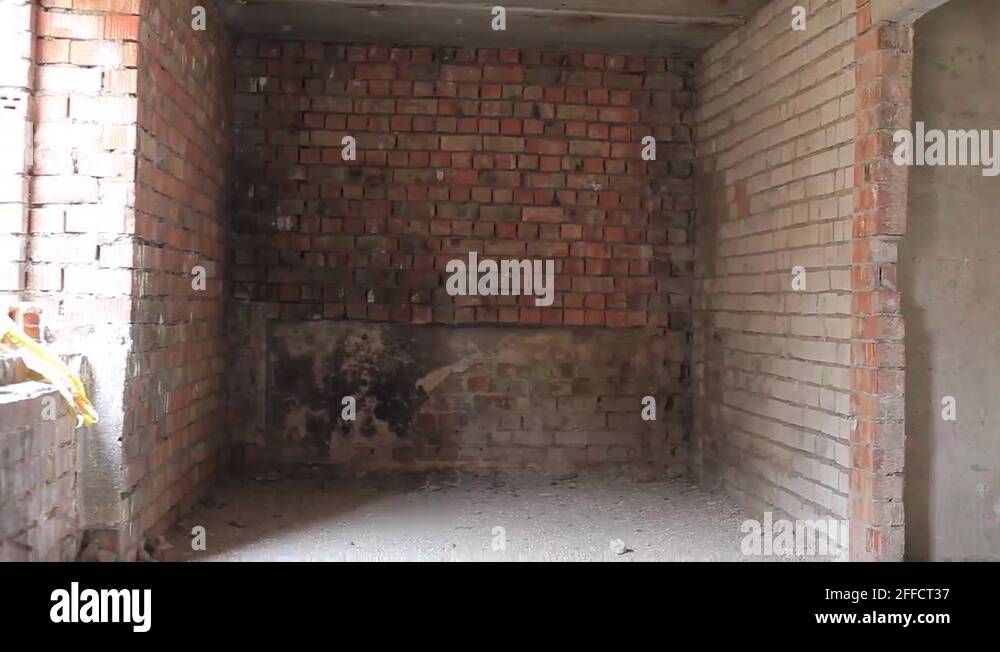 Stalker: brick wall tracking Stock Video Footage - Alamy