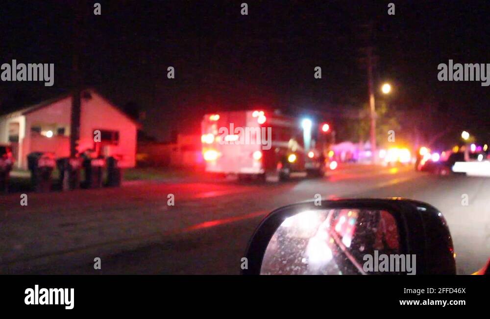 Firetruck and crews arriving on scene of a shooting Stock Video Footage ...