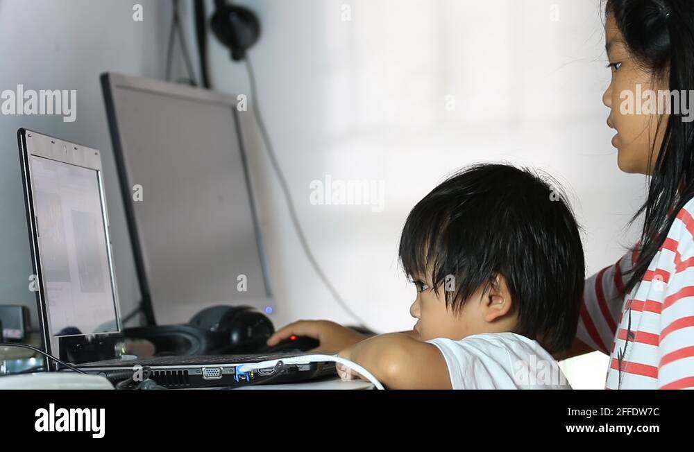 Sister computer Stock Videos & Footage - HD and 4K Video Clips - Alamy