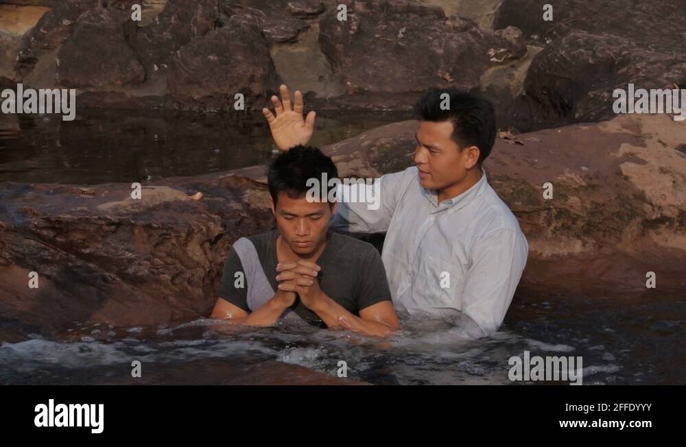 Baptism baptize Stock Videos & Footage - HD and 4K Video Clips - Alamy