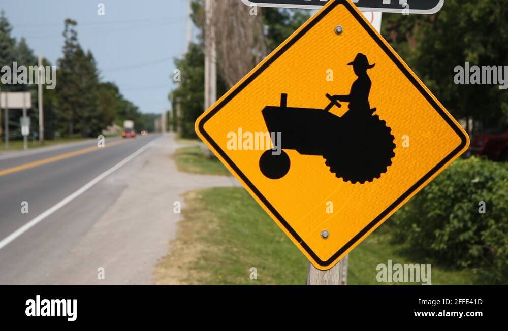 Tractor warning sign Stock Videos & Footage - HD and 4K Video Clips - Alamy