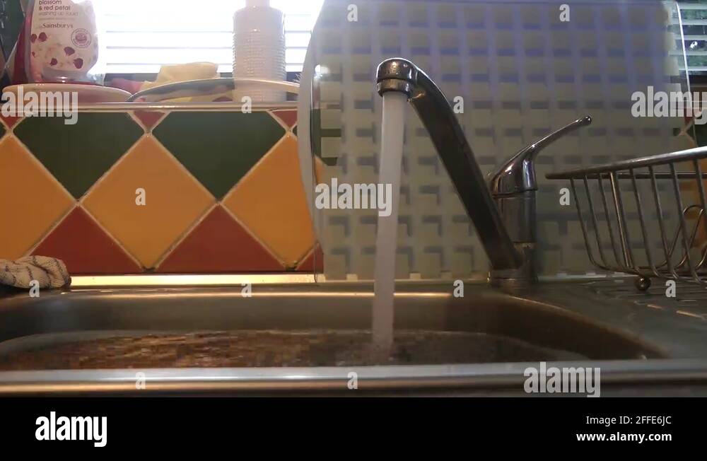 Running the tap Stock Videos & Footage - HD and 4K Video Clips - Alamy