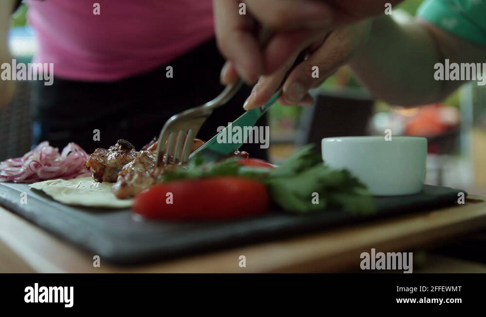 Man eating pork meat Stock Videos & Footage - HD and 4K Video Clips - Alamy