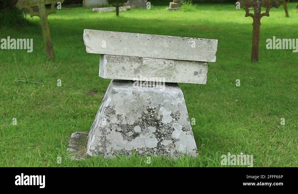 Stone head stones Stock Videos & Footage - HD and 4K Video Clips - Alamy