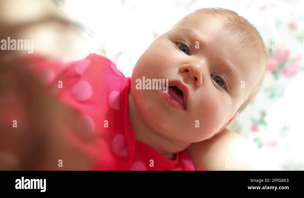 Baby three arms Stock Videos & Footage - HD and 4K Video Clips - Alamy