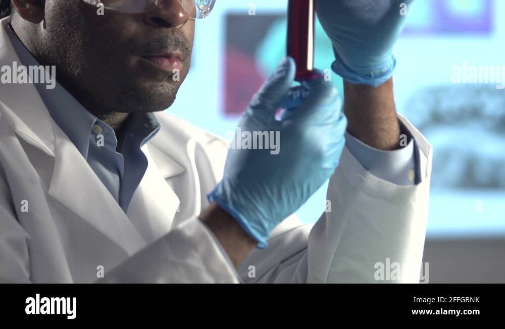 Scientist examining vial in laboratory Stock Videos & Footage - HD and ...