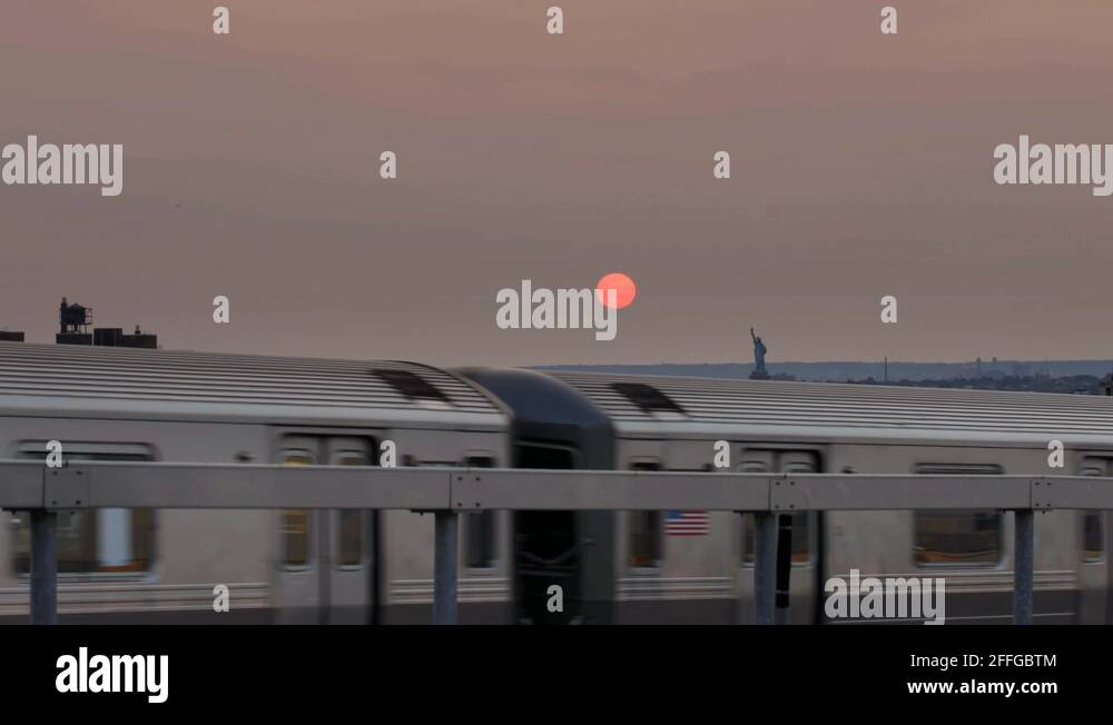 Statue of Liberty subway train elevated track sunset 4K New York City ...