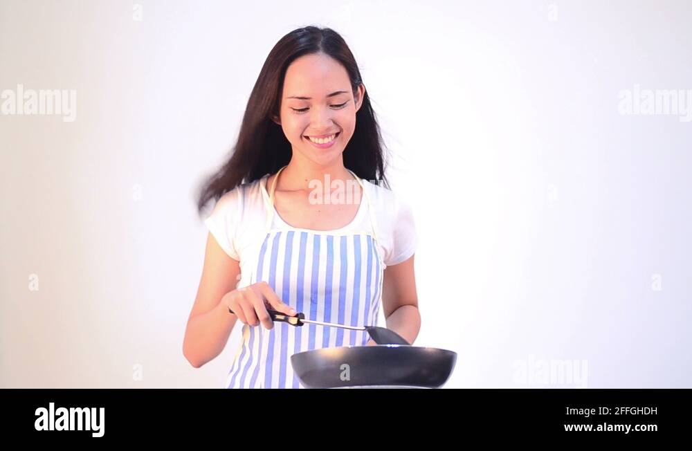 Asian girl cooking Stock Videos & Footage - HD and 4K Video Clips - Alamy