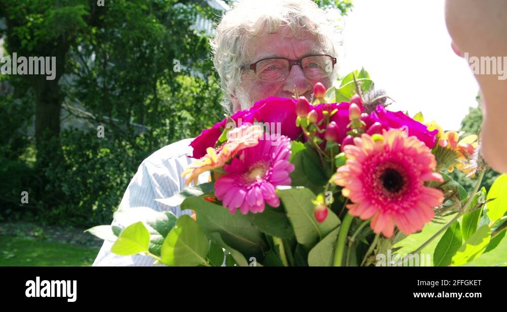 Man giving flowers Stock Videos & Footage - HD and 4K Video Clips - Alamy