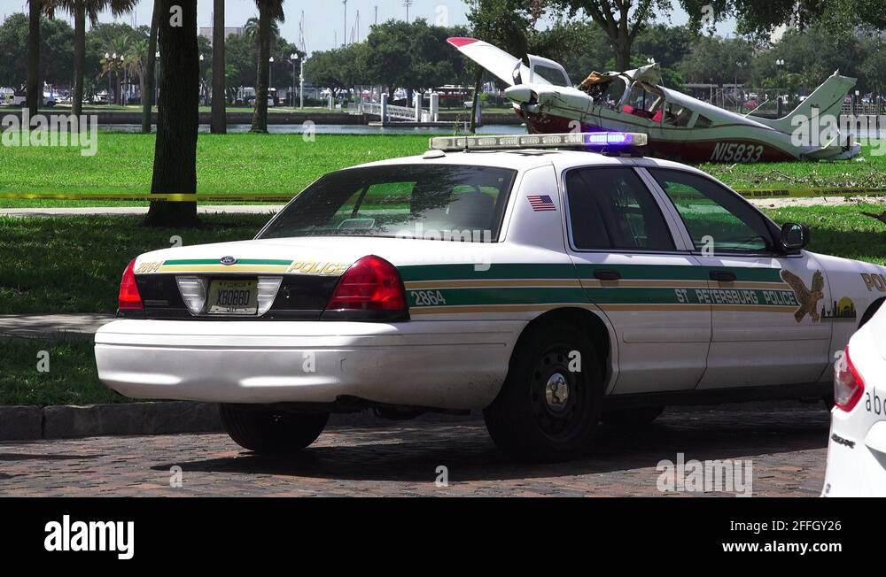 Police Car Plane Crash Wreckage In Background 4K Stock Video Footage ...