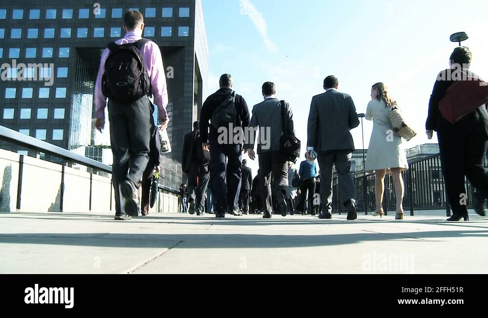 Commuters walking people business working workers travel crowd hectic ...