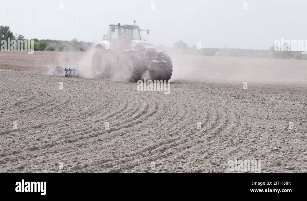 Tractor plowing black earth plow Stock Videos & Footage - HD and 4K ...